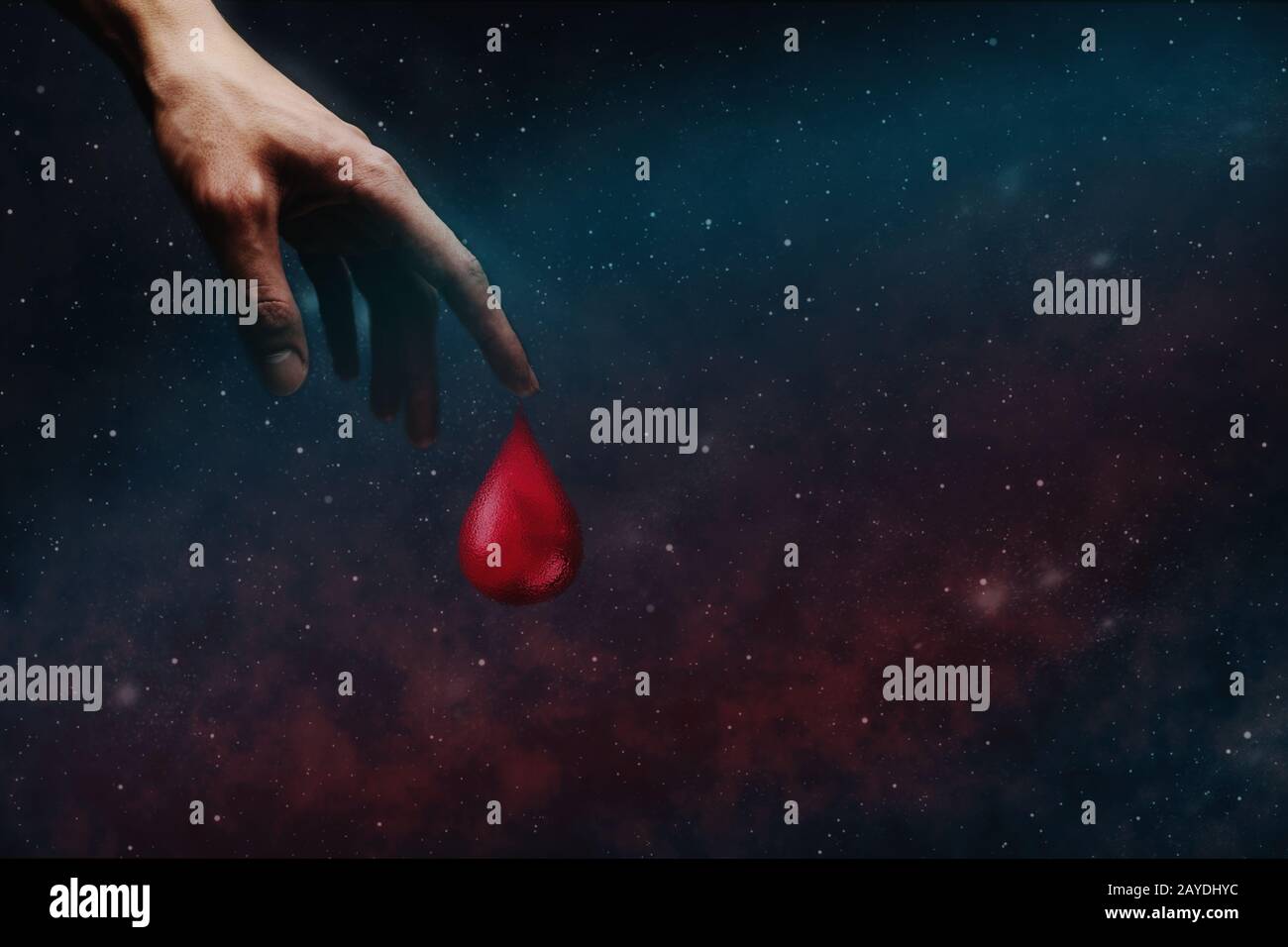 Human hand blood drop. Nebula dust in infinite space. World Blood Donor ...