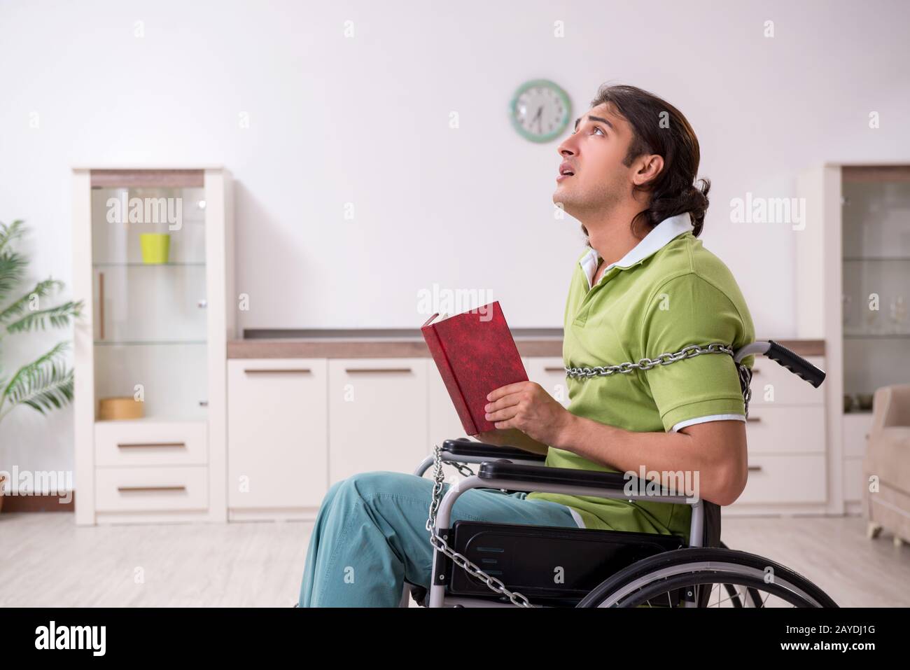 Restrained wheelchair hi-res stock photography and images - Alamy