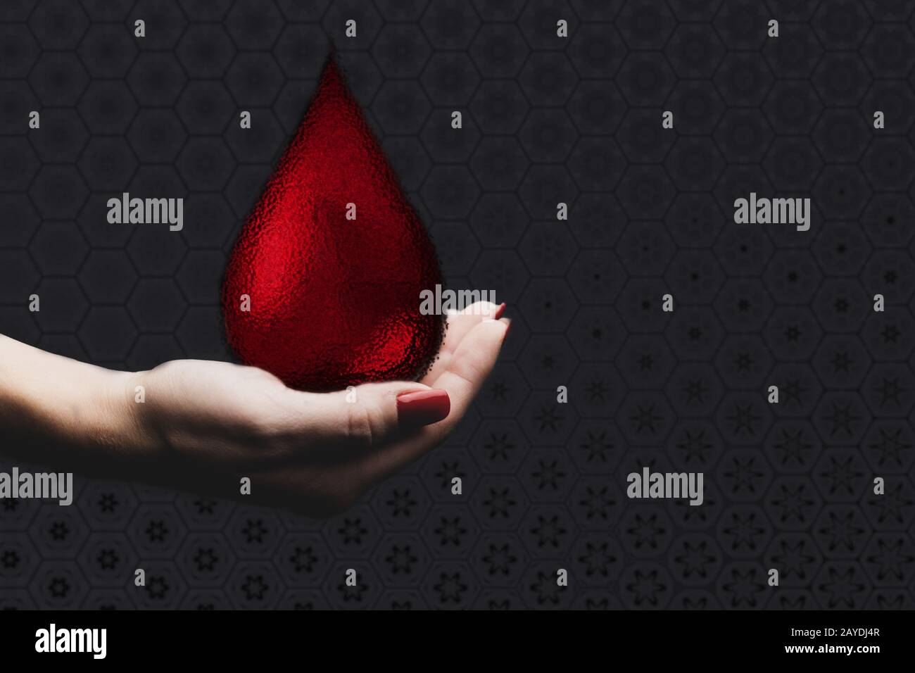Human hand blood drop. Nebula dust in infinite space. World Blood Donor ...