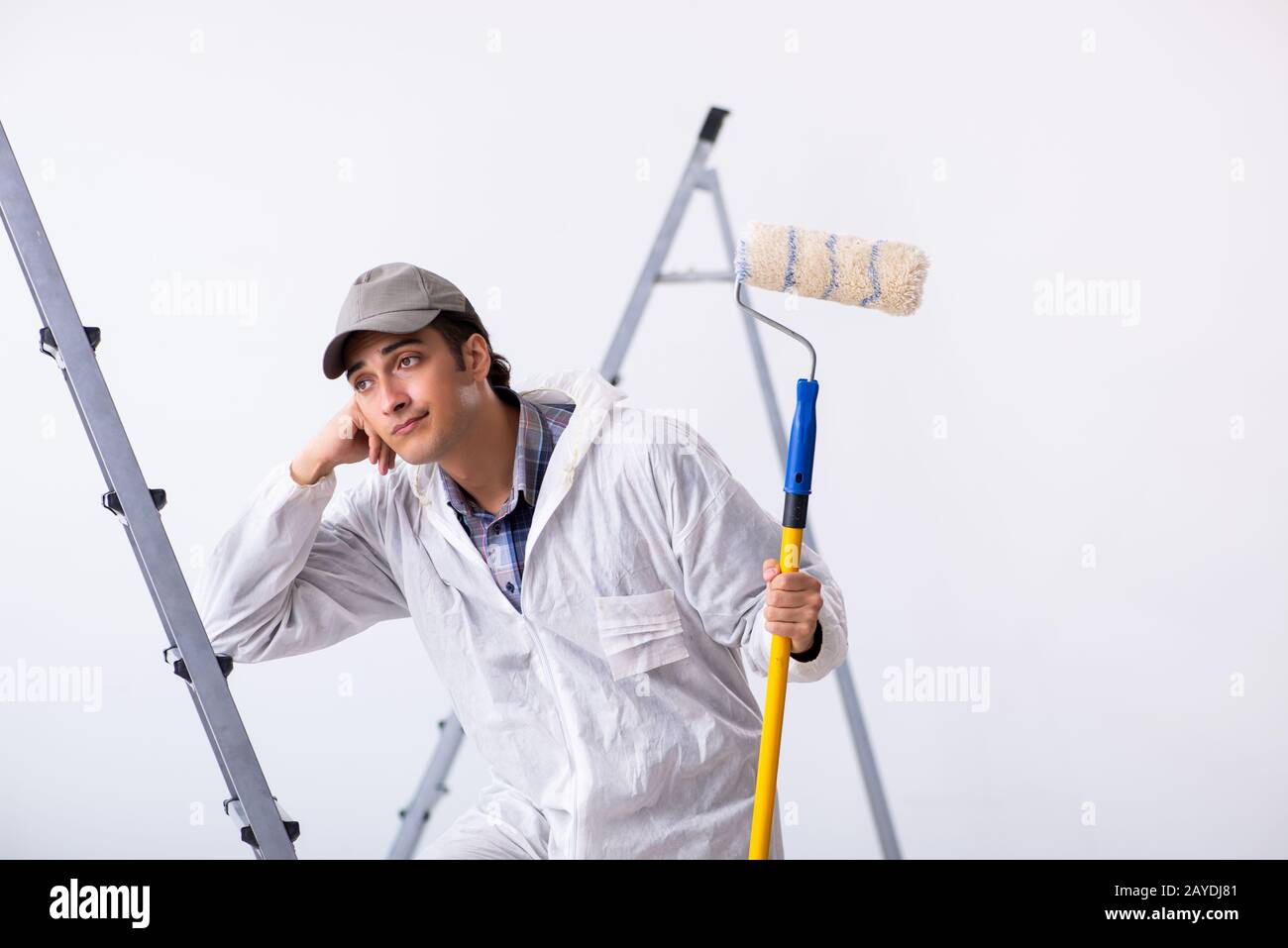 Painter working at construction site Stock Photo - Alamy