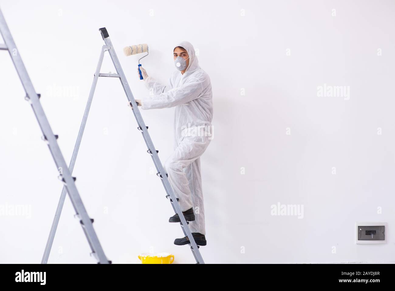 Painter working at construction site Stock Photo - Alamy