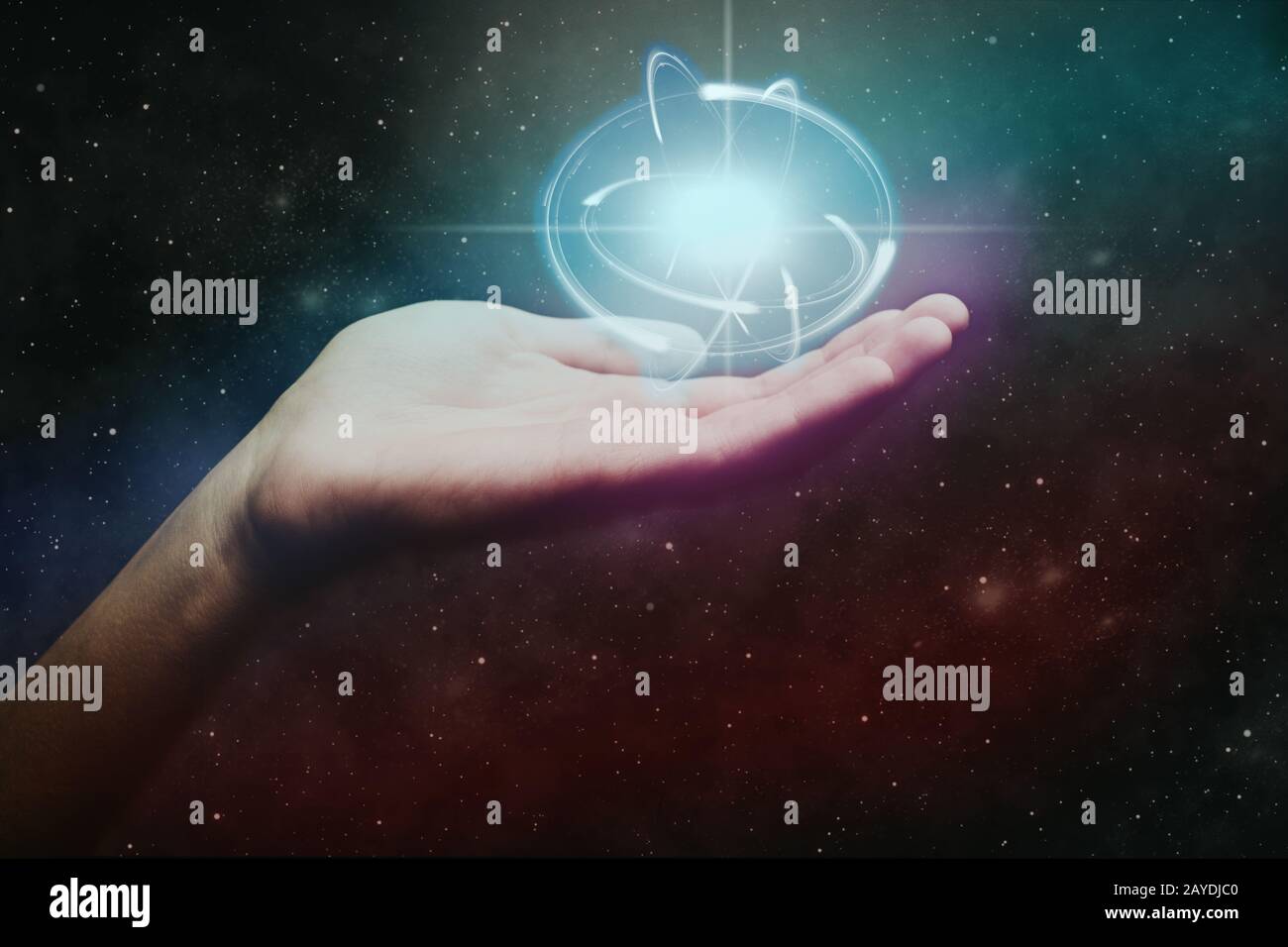 Human hand holding atom hi-res stock photography and images - Alamy