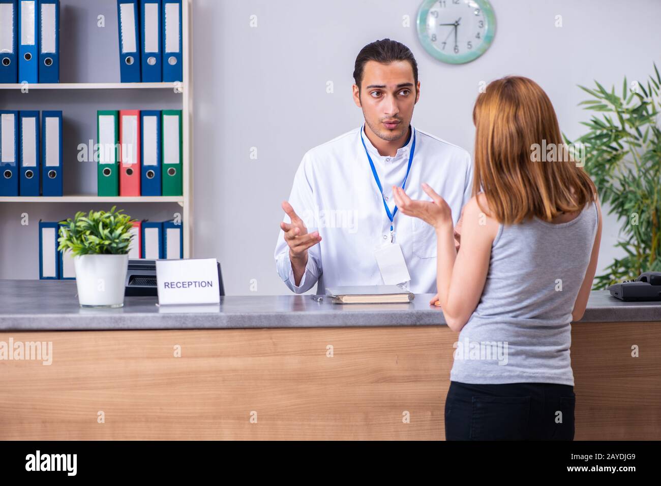 Young patient at the reception in the hospital Stock Photo - Alamy