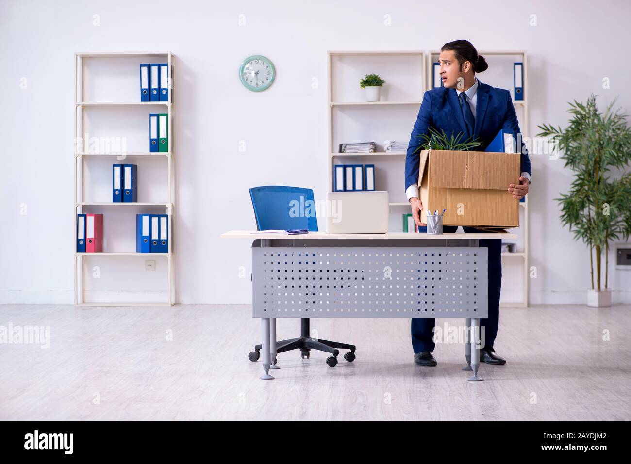 Young employee being made redundant Stock Photo - Alamy
