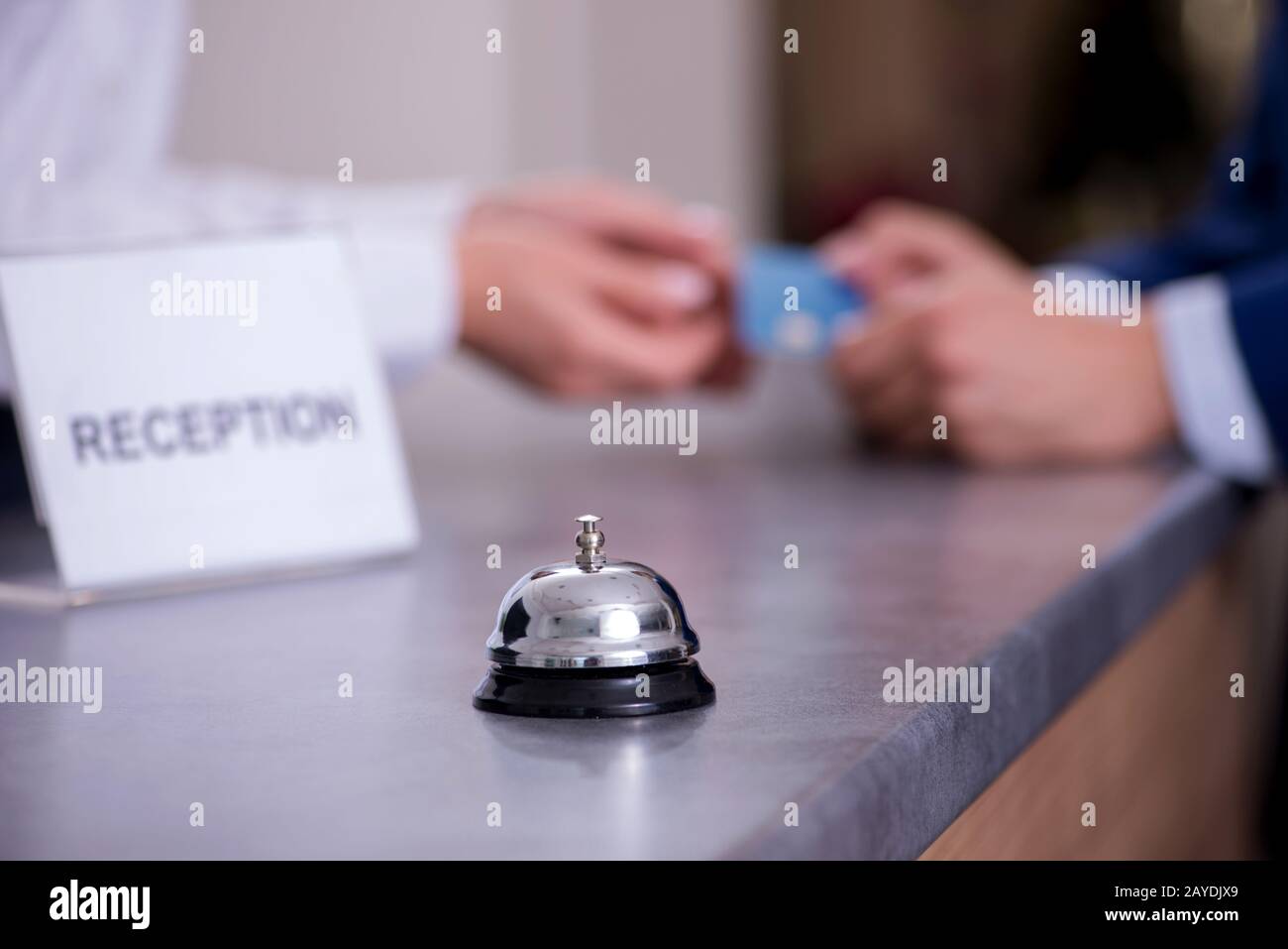 Hotel reception bell at the counter Stock Photo - Alamy