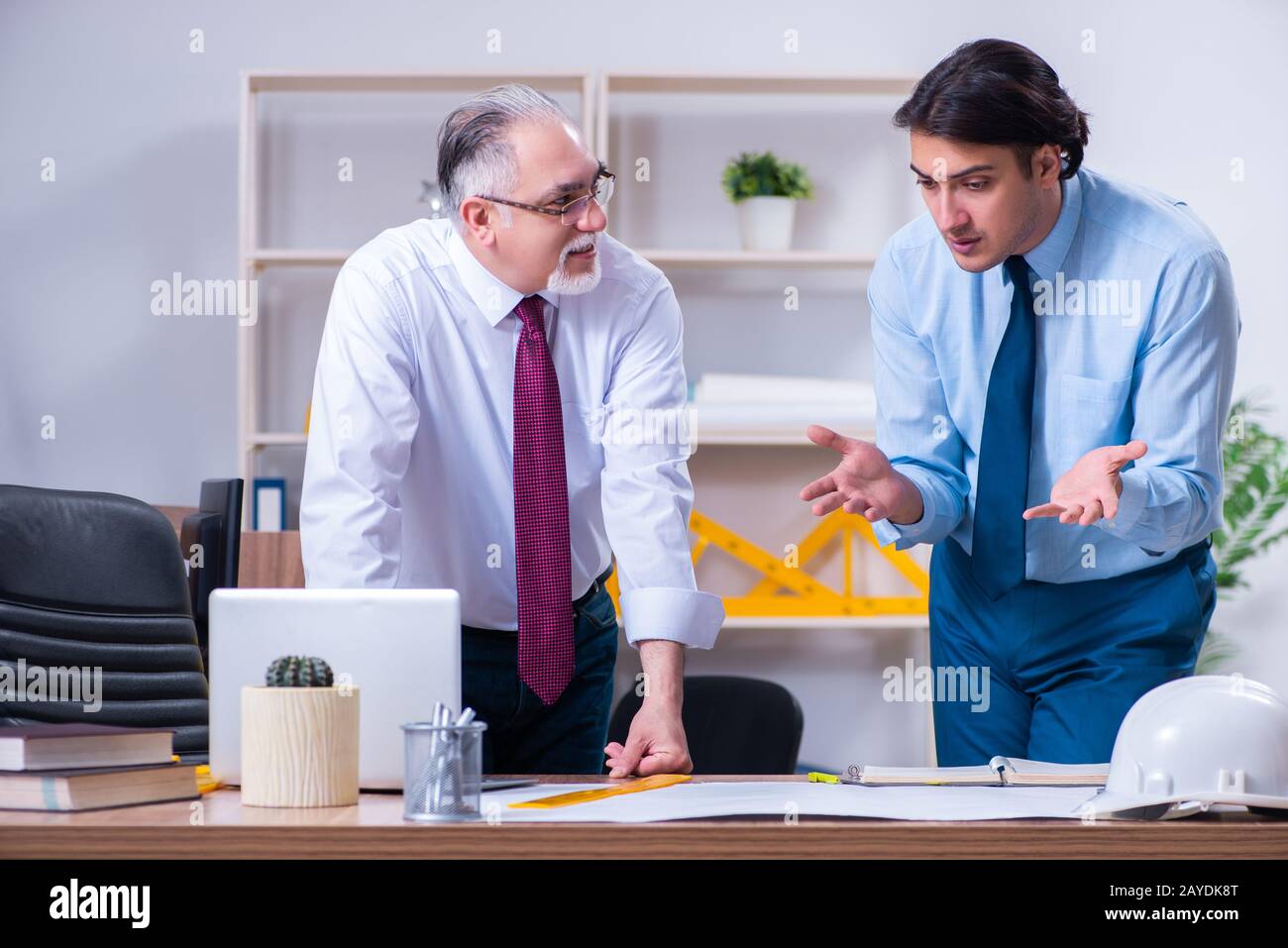 Two architects working on the project Stock Photo - Alamy