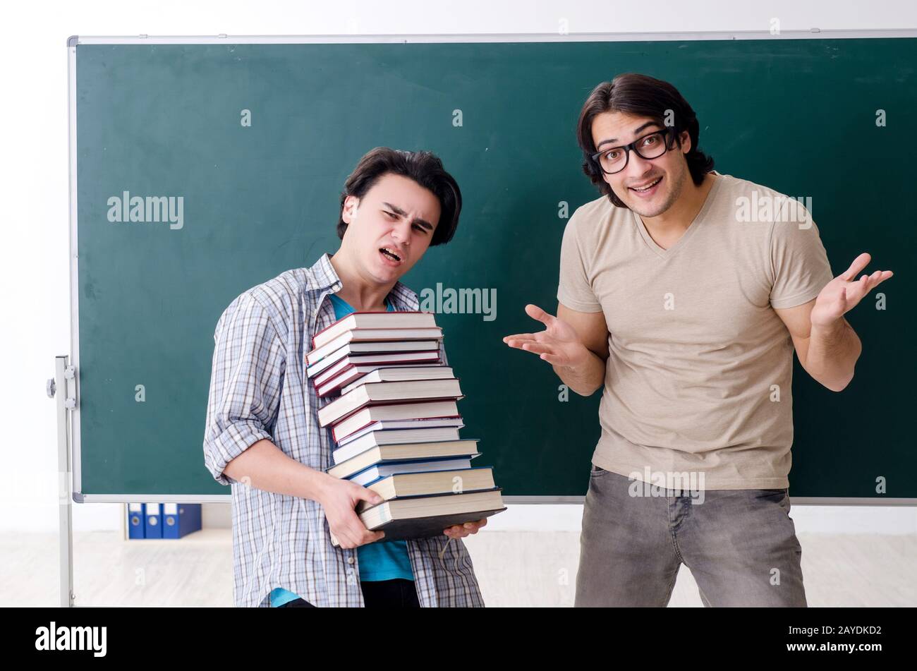 Two male students in the classroom Stock Photo - Alamy