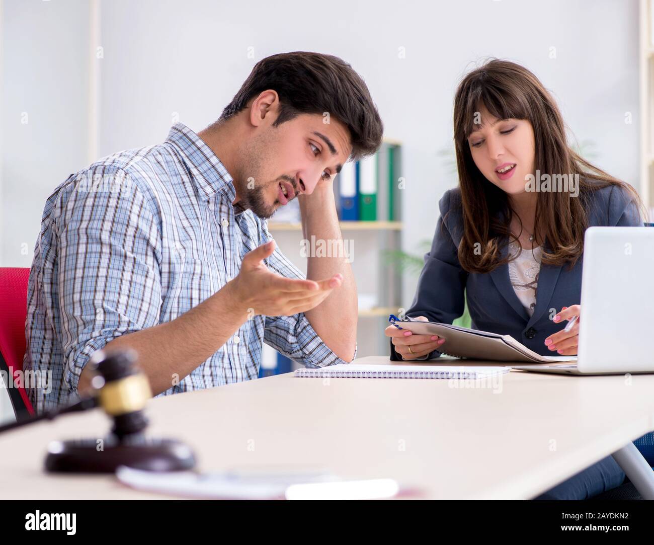 Female lawyer meeting with his male client in the office Stock Photo ...