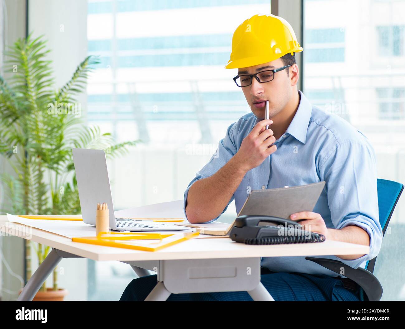 Construction engineer working on new project Stock Photo - Alamy