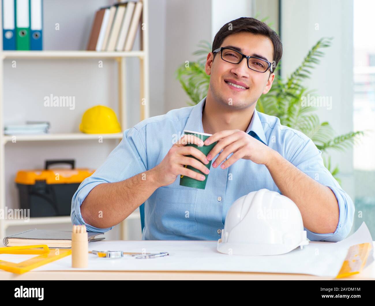 Construction engineer working on new project Stock Photo - Alamy