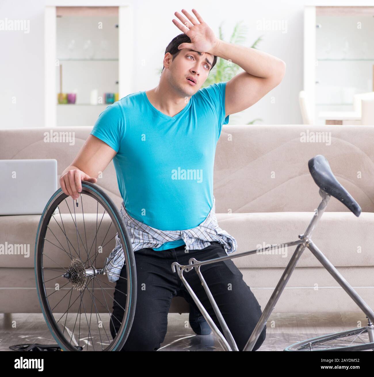 Man bicycle exhausted hi-res stock photography and images - Alamy