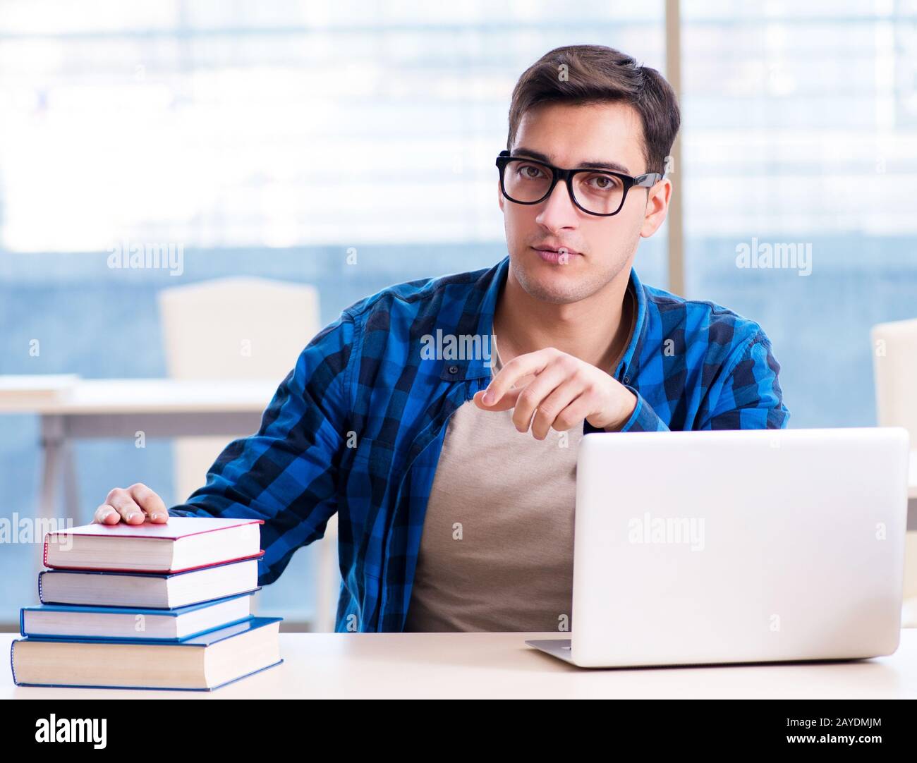 Student in telelearning distance learning concept reading in lib Stock ...
