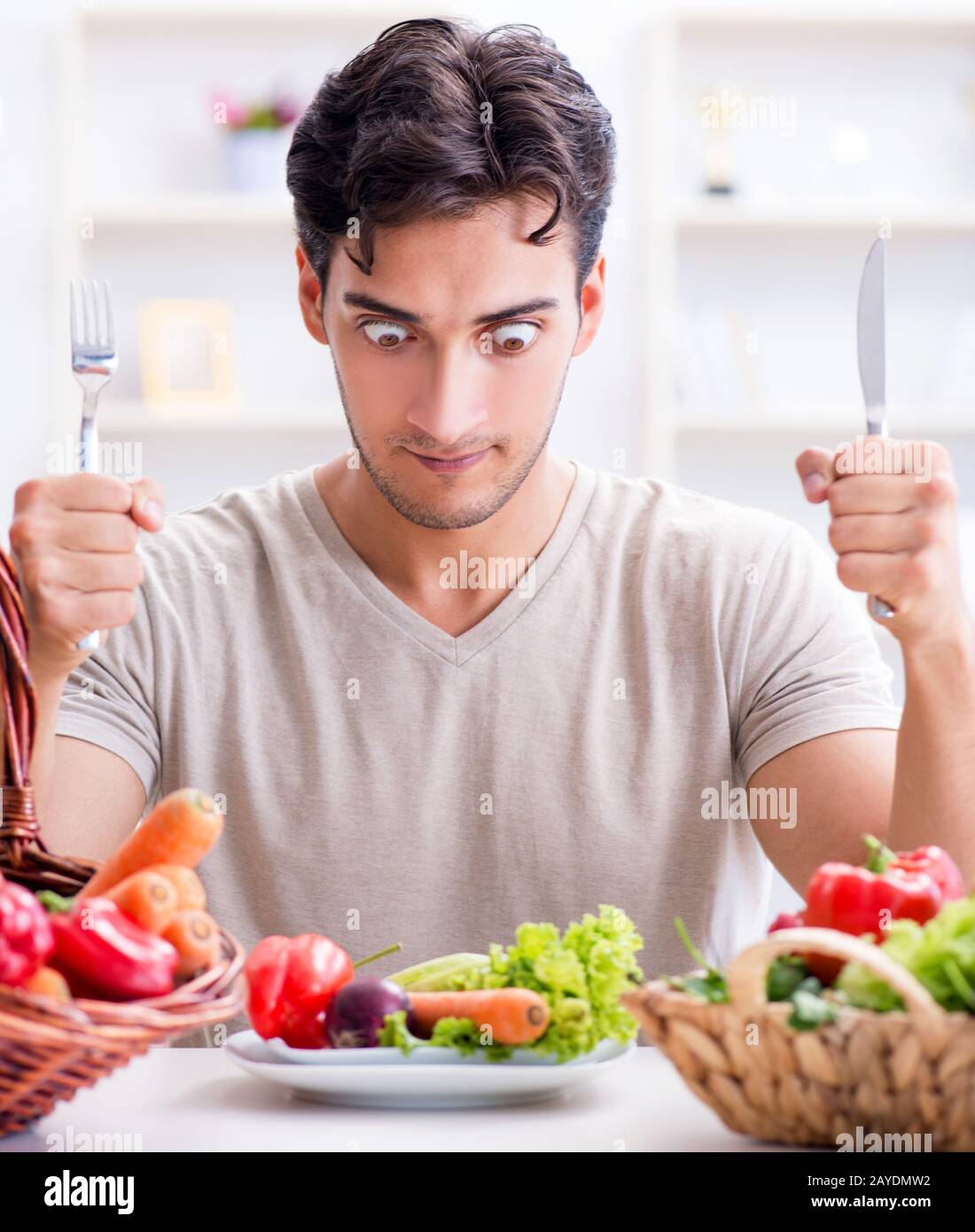 The young man in healthy eating and dieting concept Stock Photo - Alamy