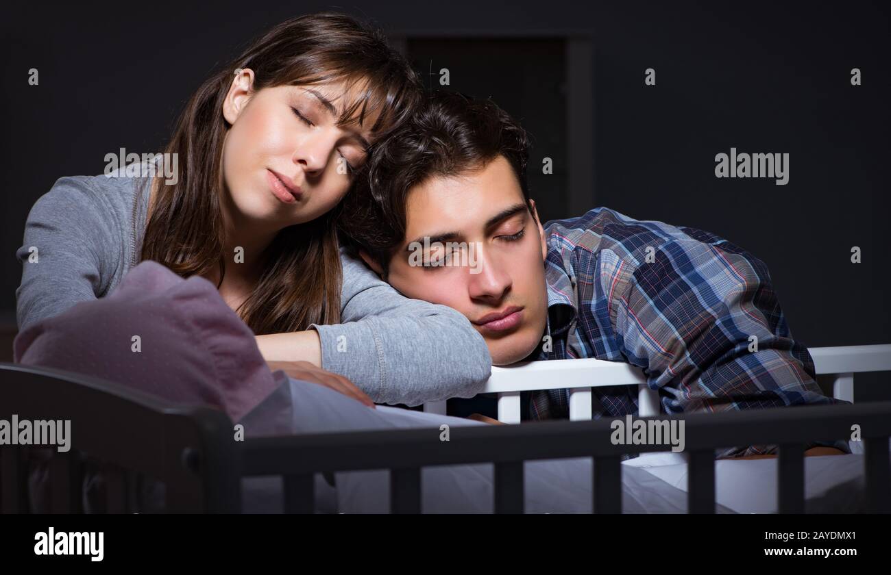 Baby awake parents sleep hi-res stock photography and images - Alamy