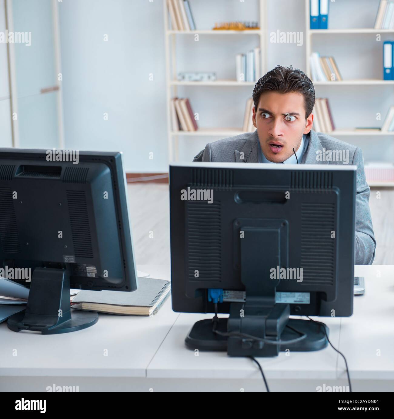 Worker watching screens hi-res stock photography and images - Alamy