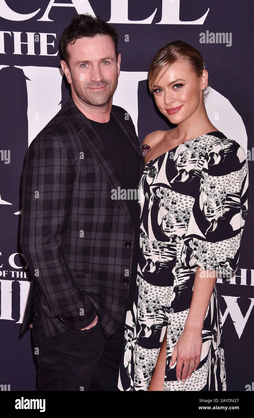 HOLLYWOOD, CA - FEBRUARY 13: Adam Fergus (L) and Hayley Erin attend the ...
