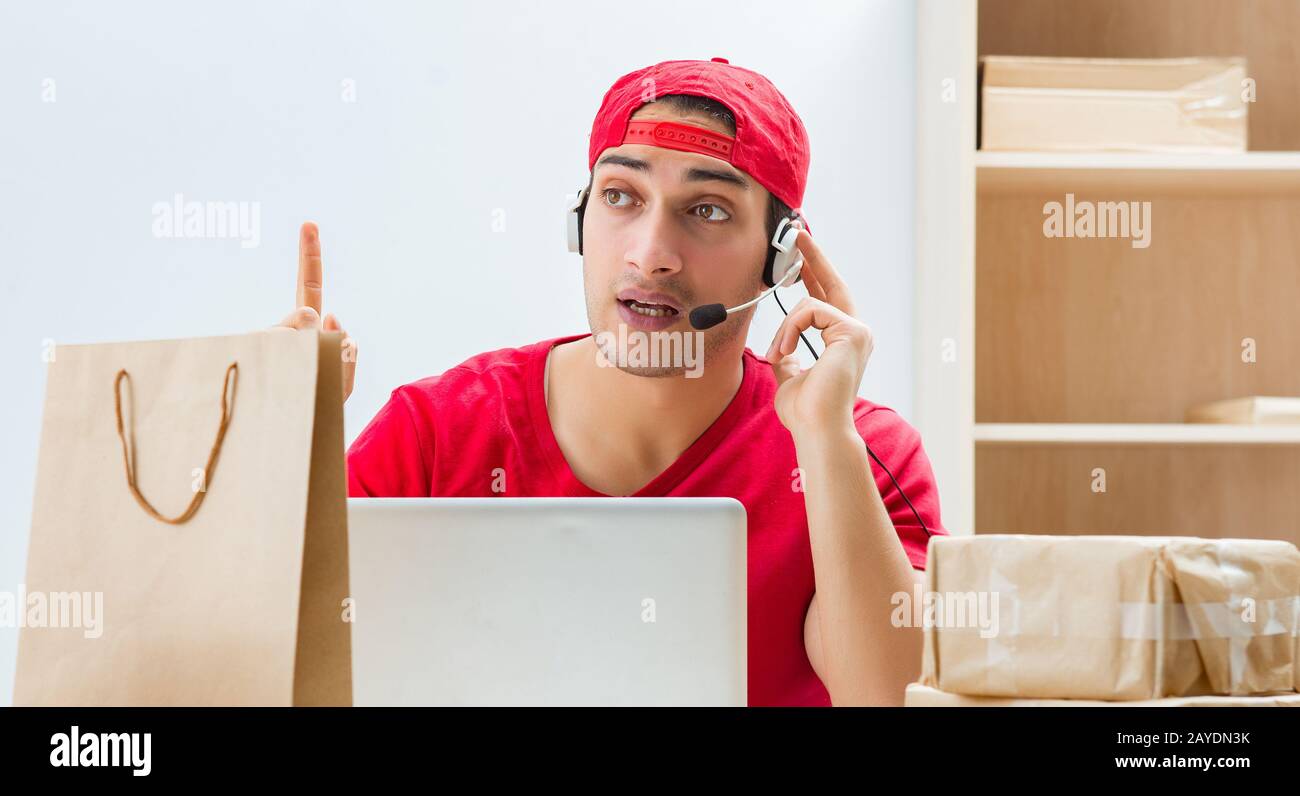 Call center worker at parcel distribution center in post office Stock ...
