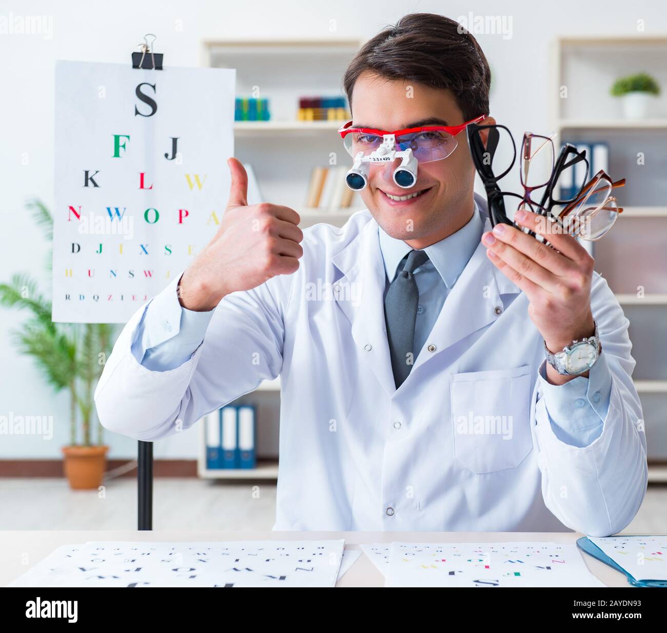 Eye doctor in eyecare concept in hospital Stock Photo - Alamy