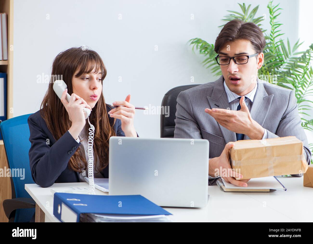 Business people receiving new mail and parcels Stock Photo - Alamy