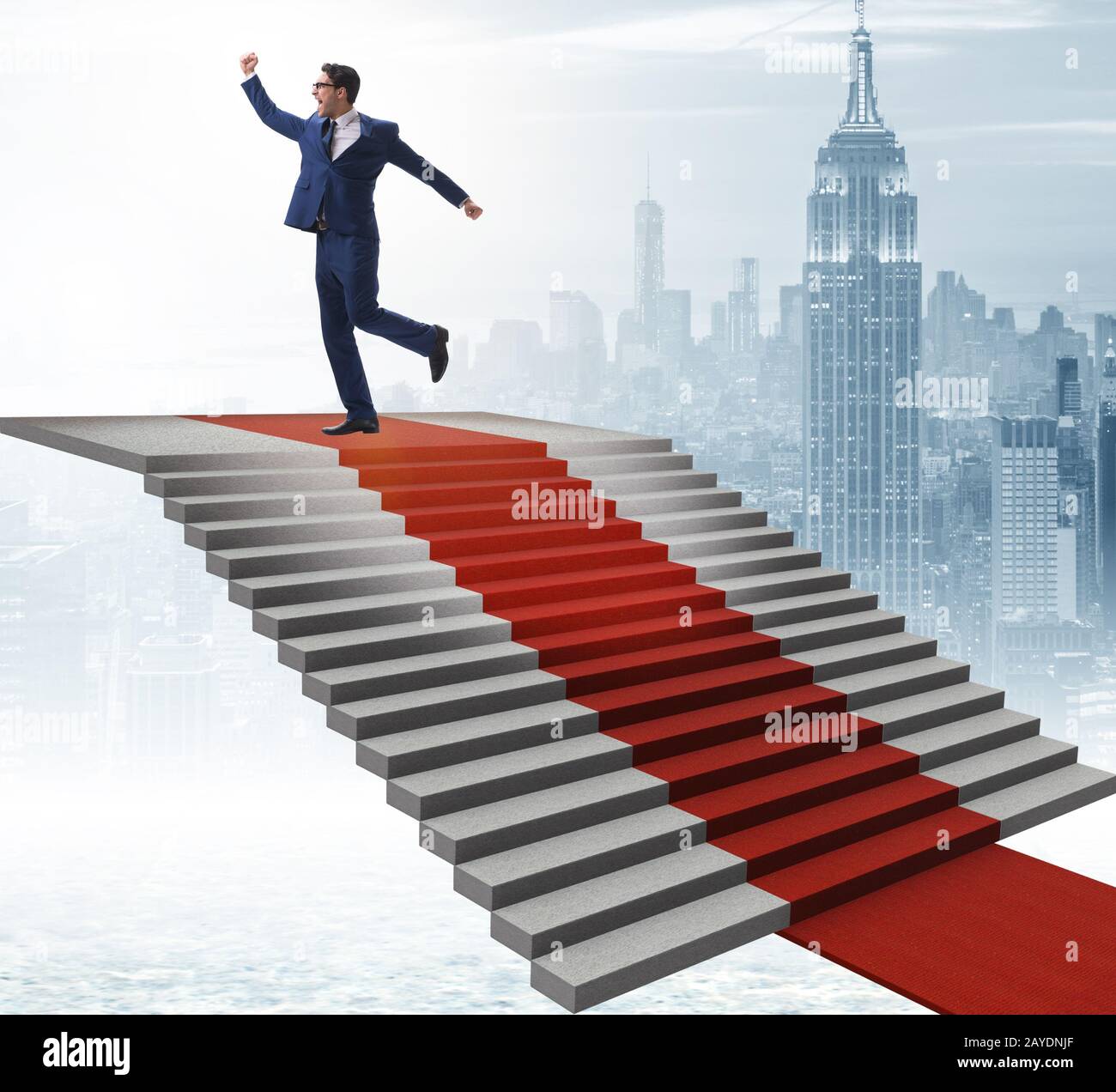 The young businessman climbing stairs and red carpet Stock Photo - Alamy