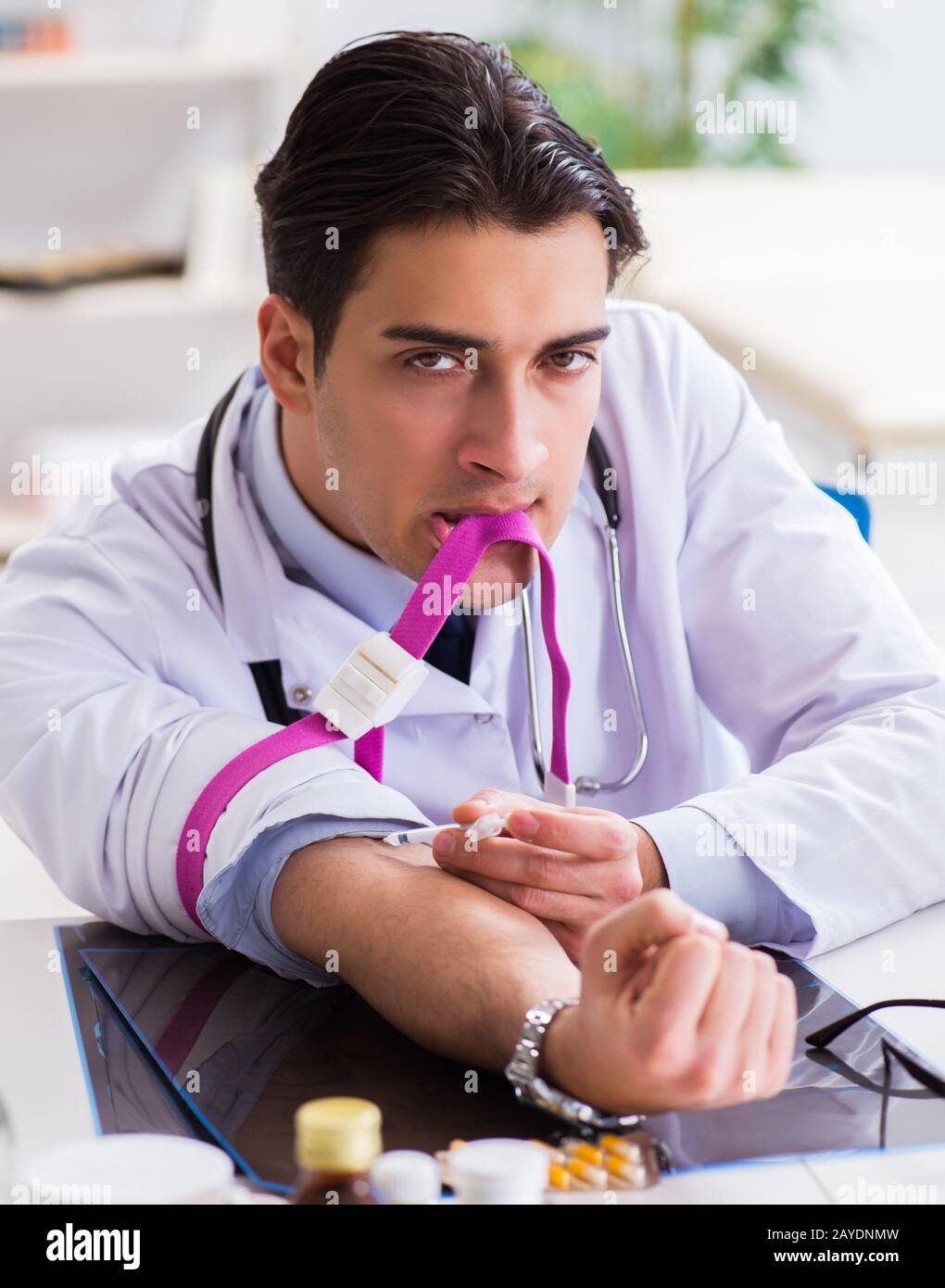 Doctor drug addict in the hospital Stock Photo - Alamy