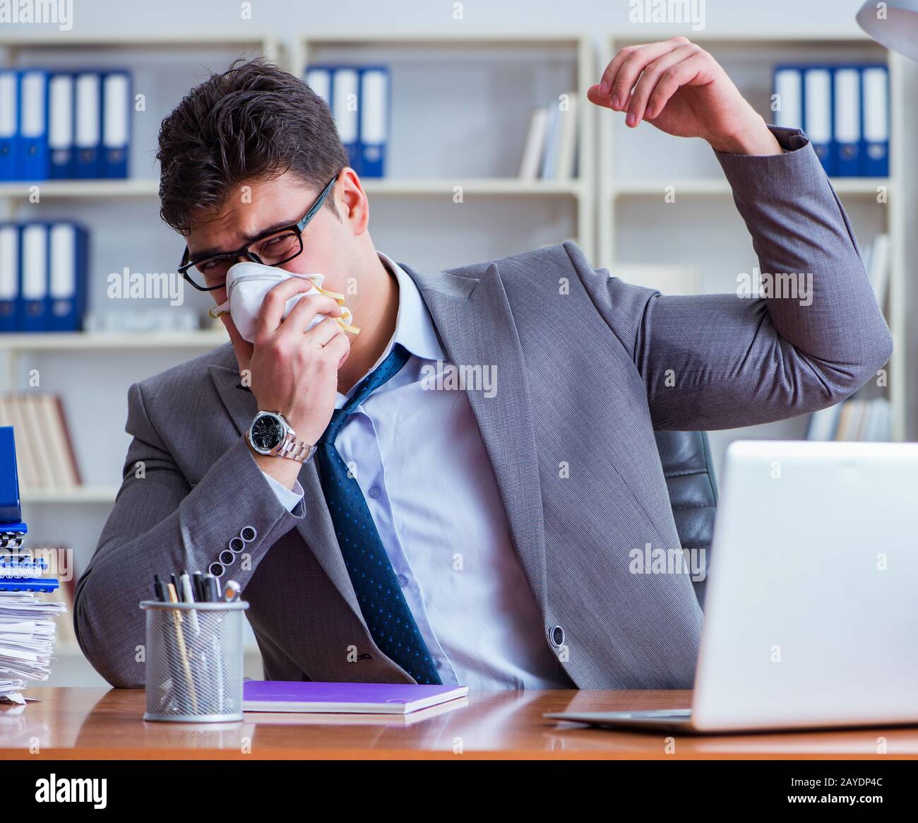 Businessman sweating excessively smelling bad in office at workp Stock ...