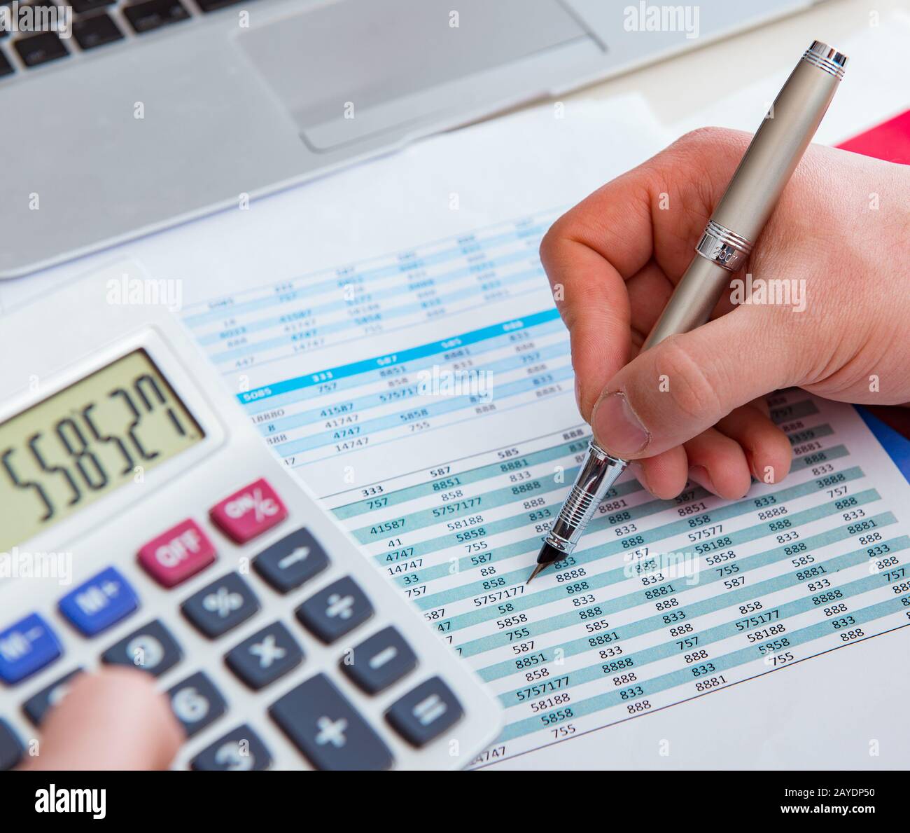 Finance analyst looking and financial reports hi-res stock photography ...