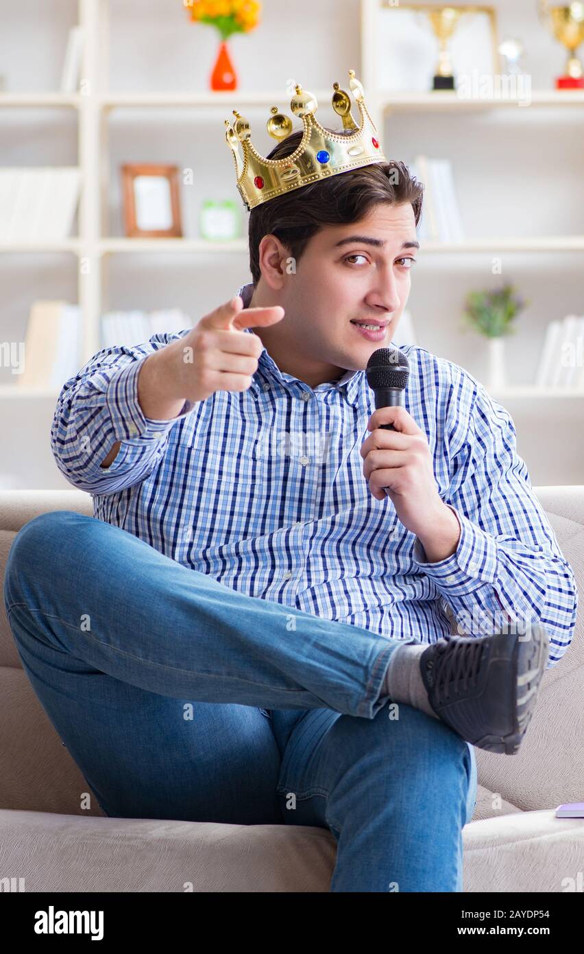 Funny man singing songs in karaoke at home Stock Photo - Alamy
