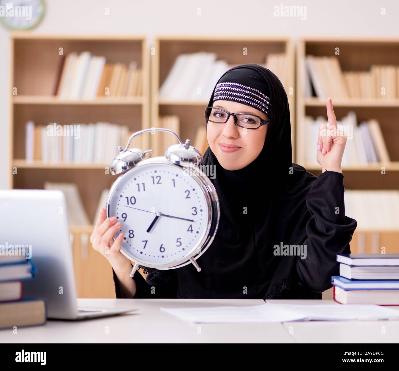 Muslim girl in hijab studying preparing for exams Stock Photo - Alamy