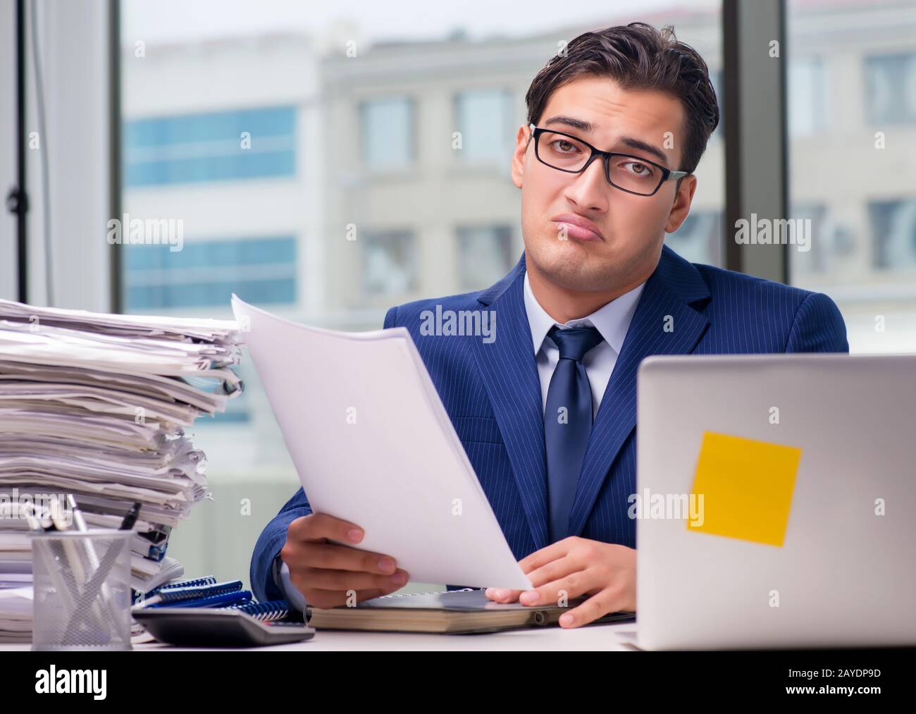 Workaholic businessman overworked with too much work in office Stock ...