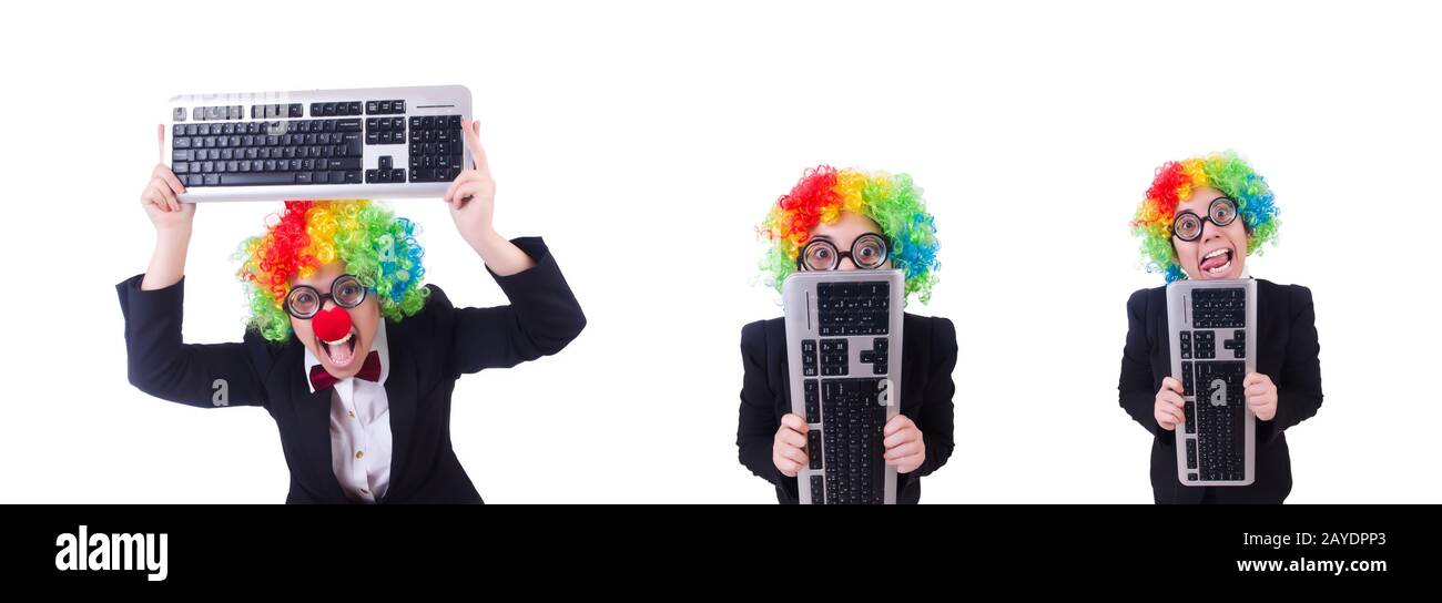 Funny clown with keyboard on white Stock Photo - Alamy