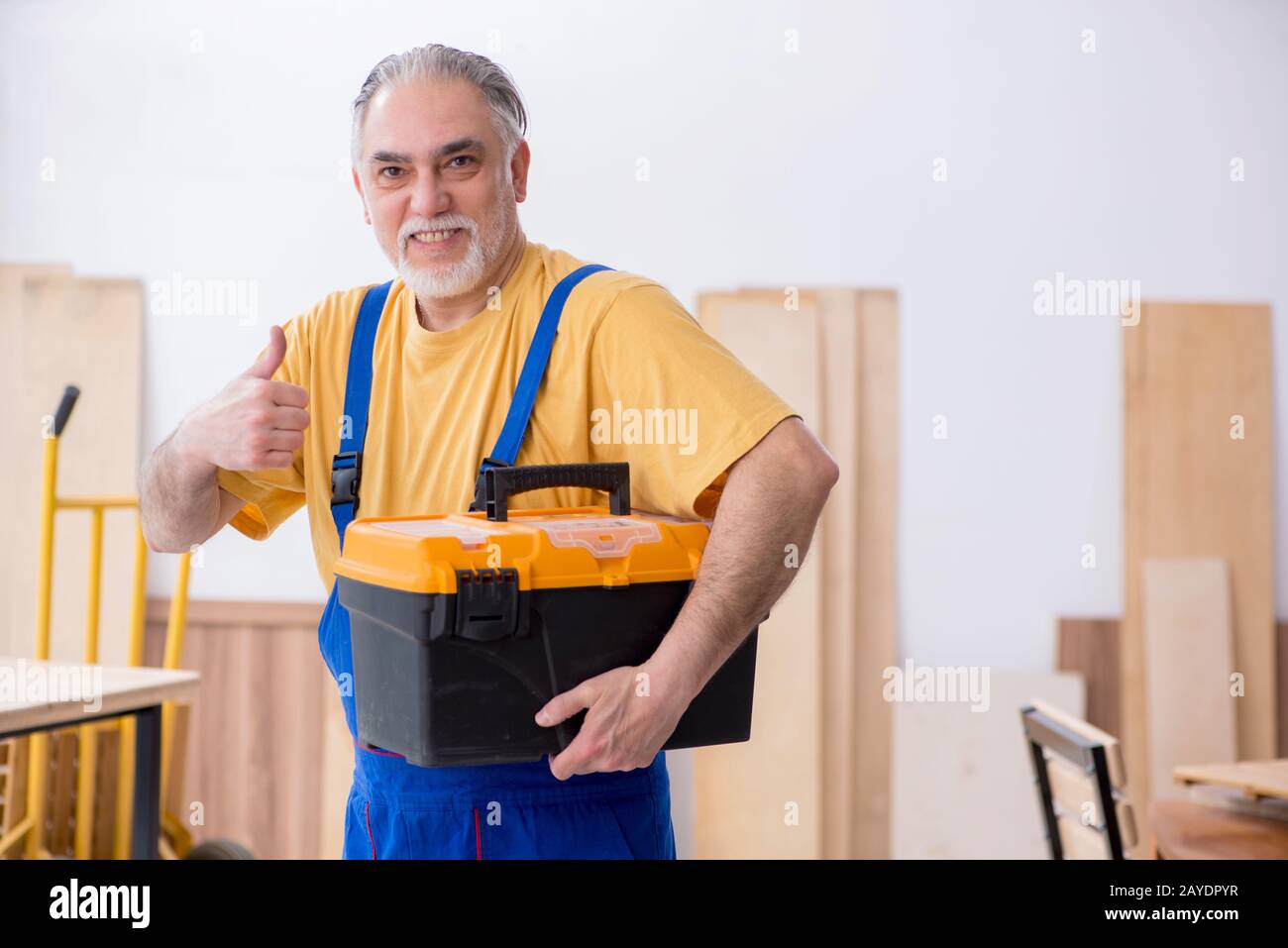 Happy carpenter thumbs up working hi-res stock photography and images ...