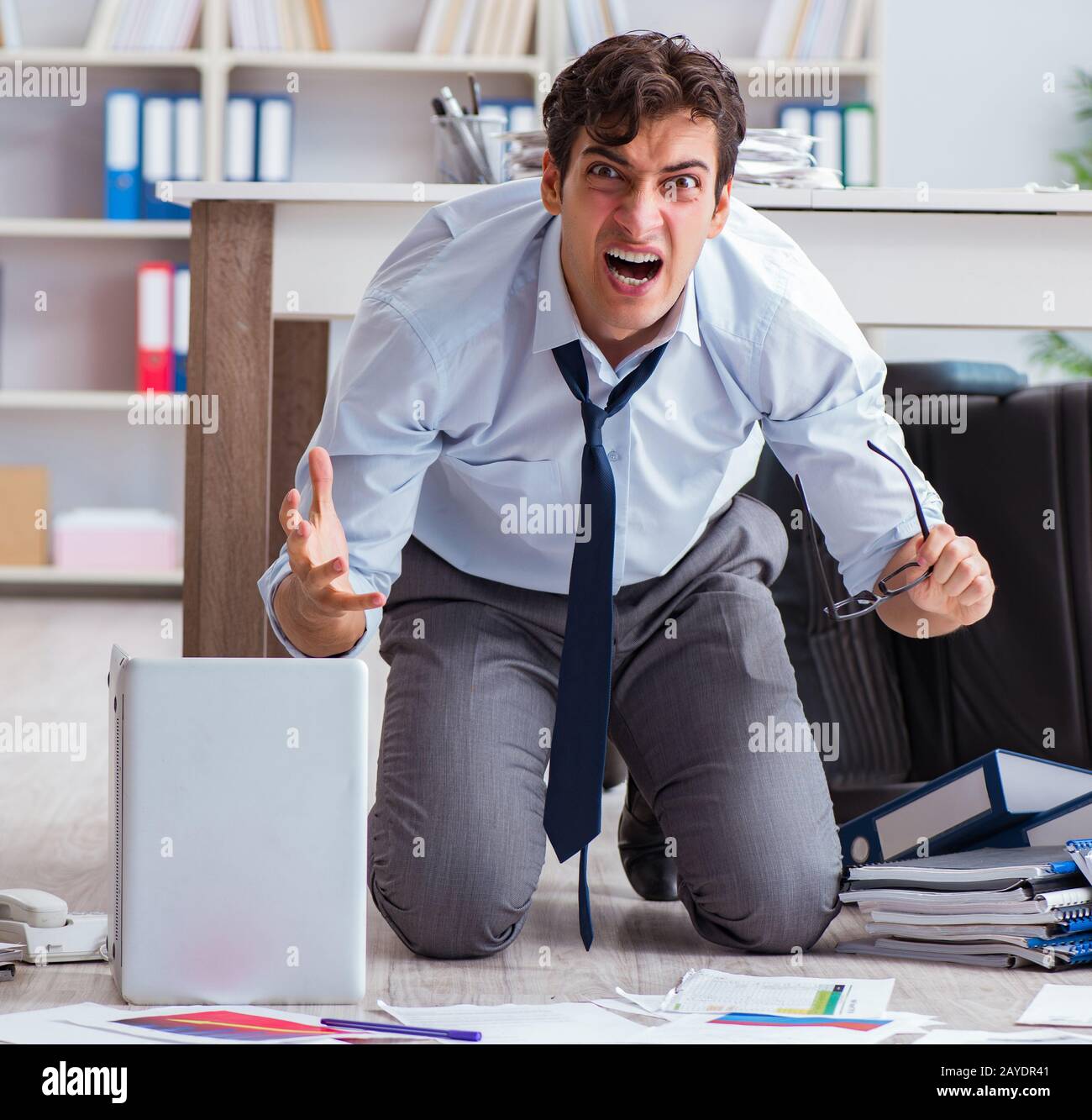 Bankrupt businessman angry in the office floor Stock Photo - Alamy