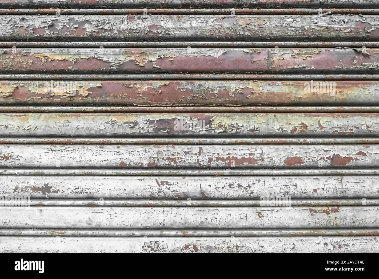 Old rusty shop shutter Stock Photo - Alamy