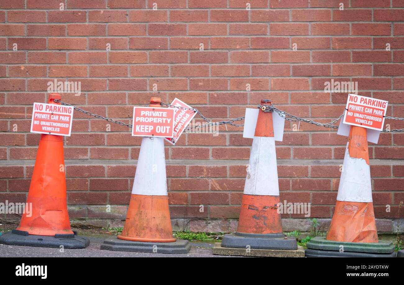 No parking keep out car signs on private traffic cones Stock Photo - Alamy
