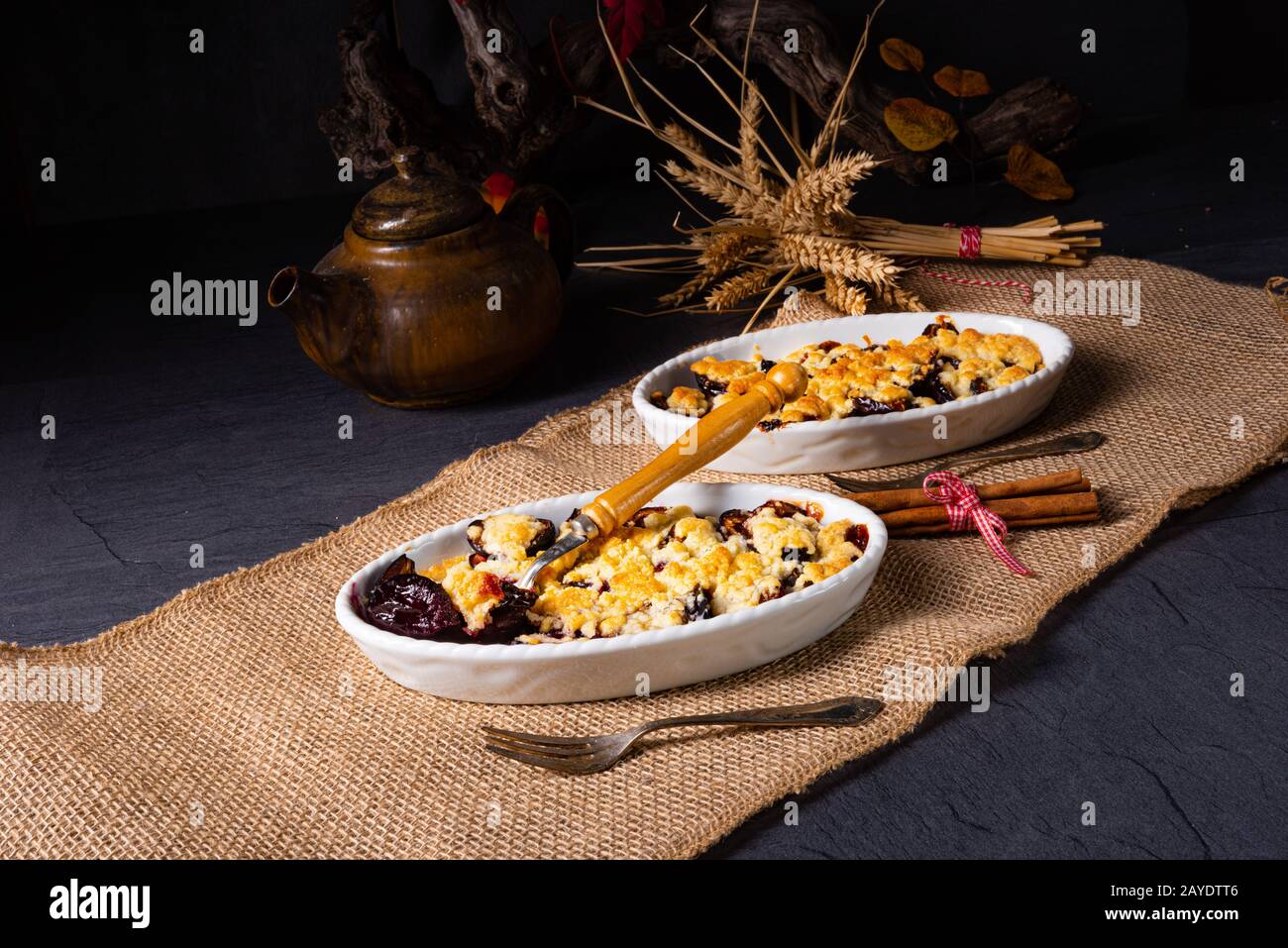 Cinnamon prunes with crumble Stock Photo - Alamy