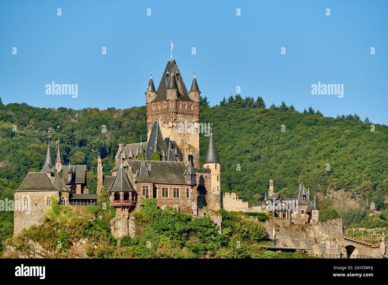 Beautiful Reichsburg castle on a hill in Cochem, Germany Stock Photo ...