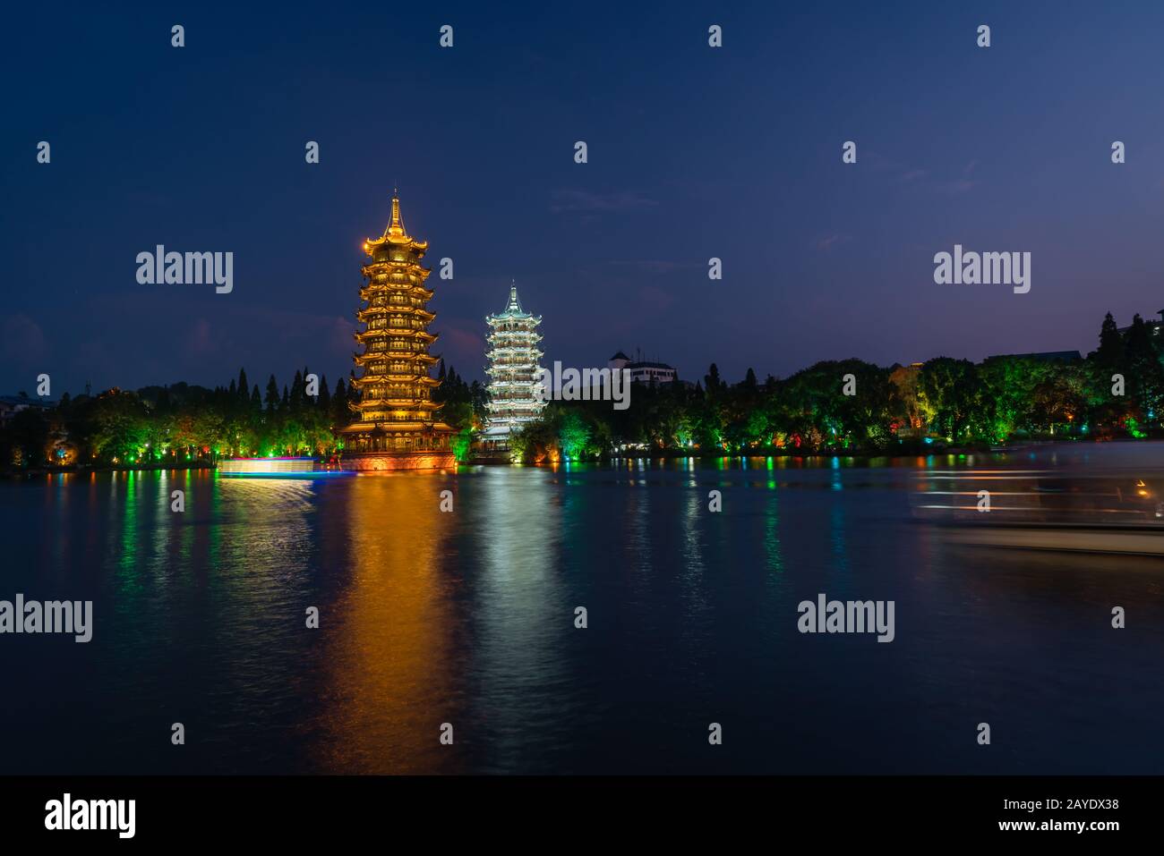Sun and Moon Pagodas Towers at night Stock Photo - Alamy