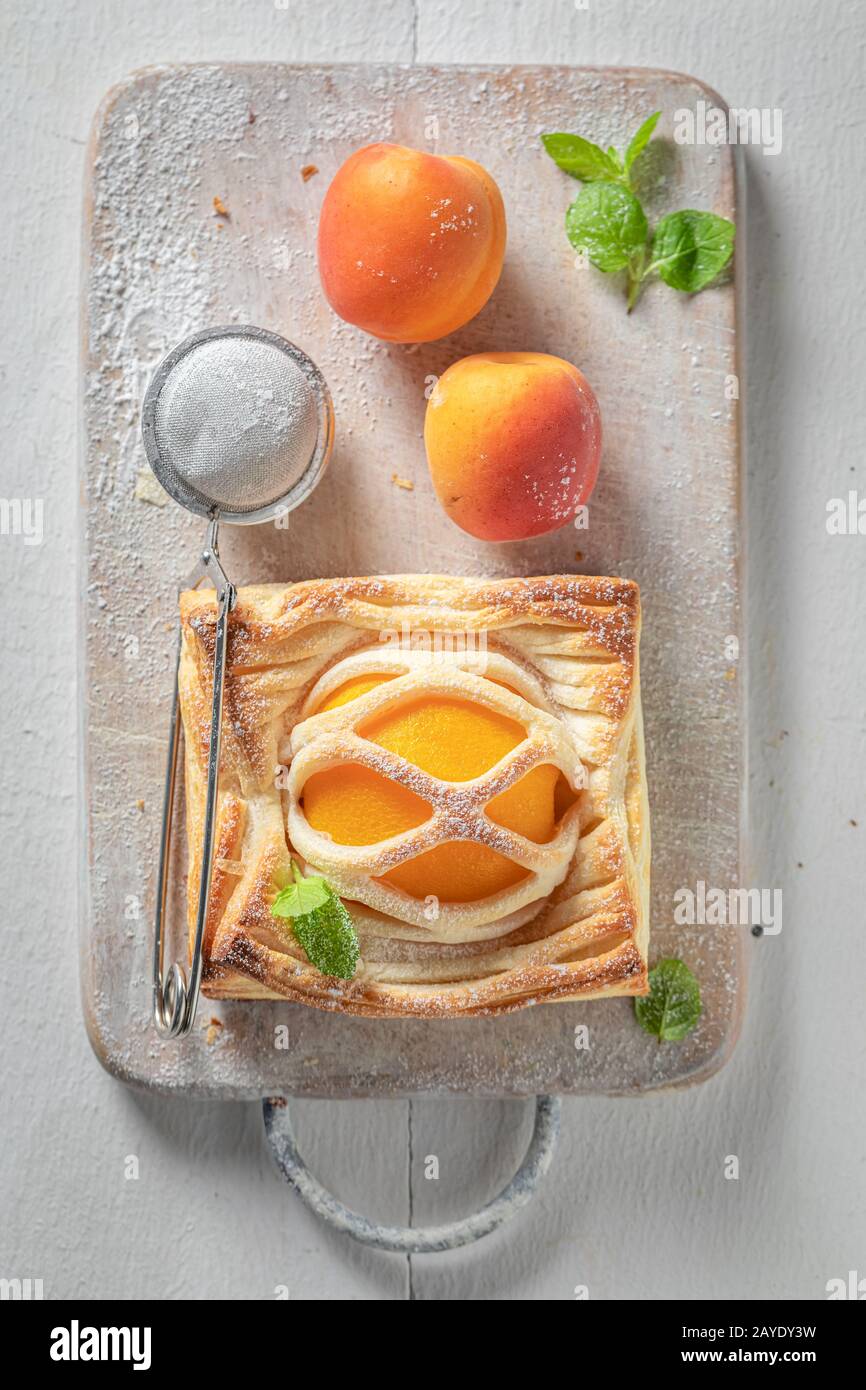 Homemade puff pastry with fresh peaches and mint Stock Photo - Alamy