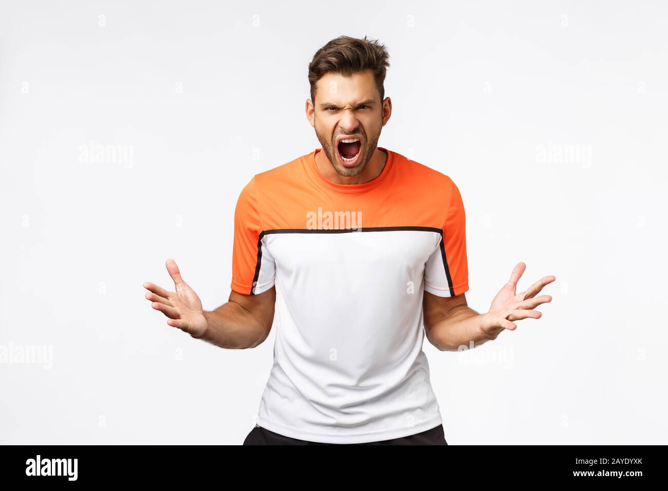 Aggressive, strong and determined, encouraged sportsman yelling and ...