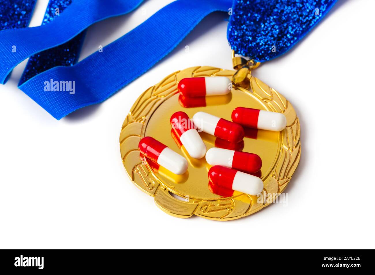 Gold medal and pills Stock Photo - Alamy