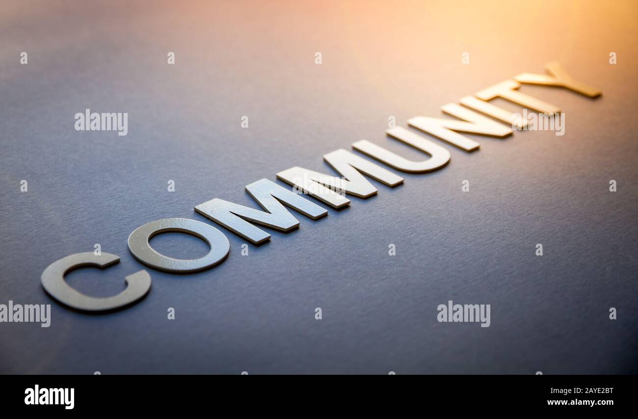 Word community written with white solid letters Stock Photo - Alamy