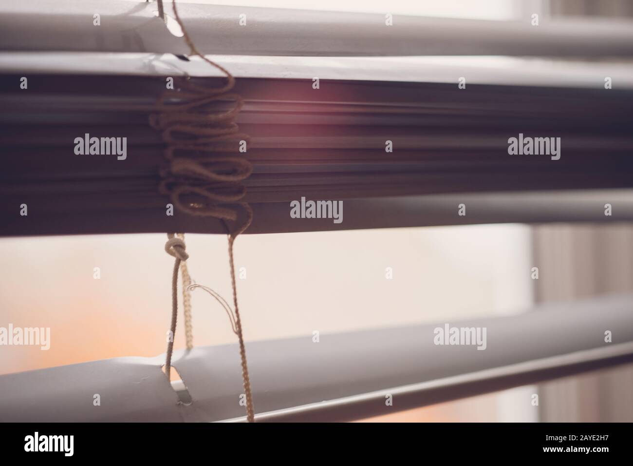 Half open horizontal blinds with gap for view Stock Photo - Alamy