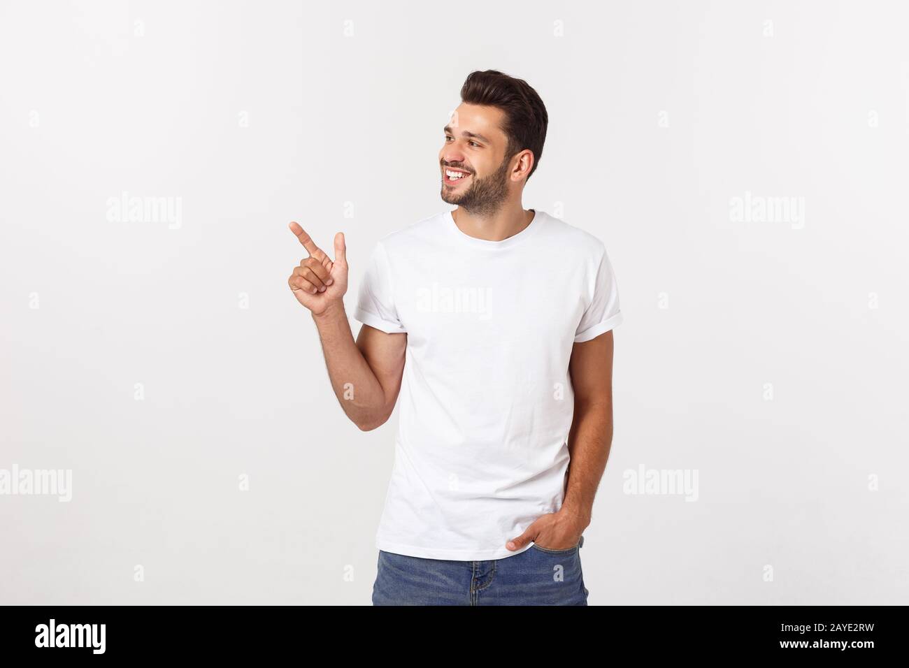 Man pointing showing copy space isolated on white background. Casual ...