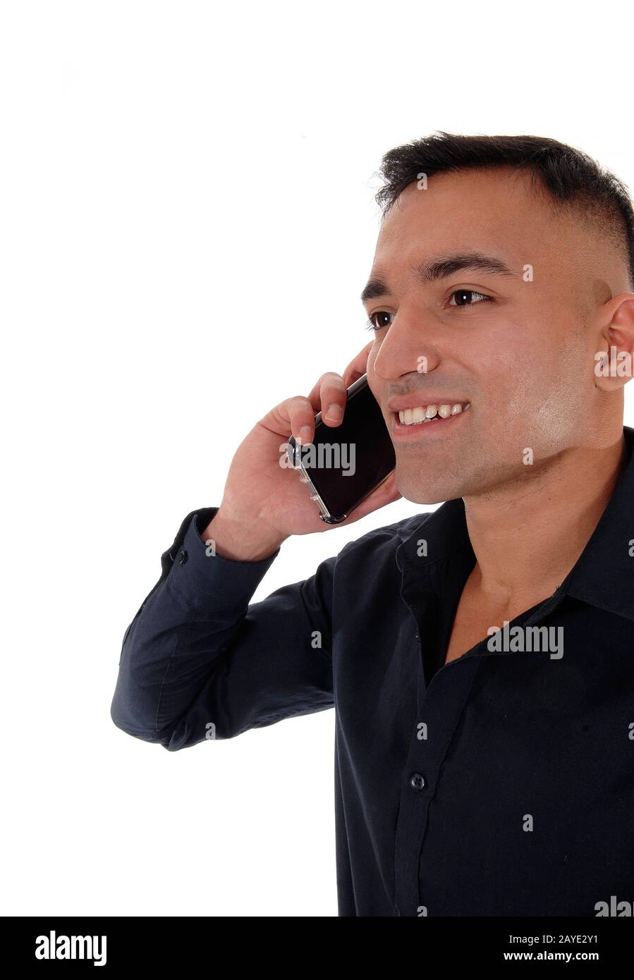 Young man talking on his phone hi-res stock photography and images - Alamy