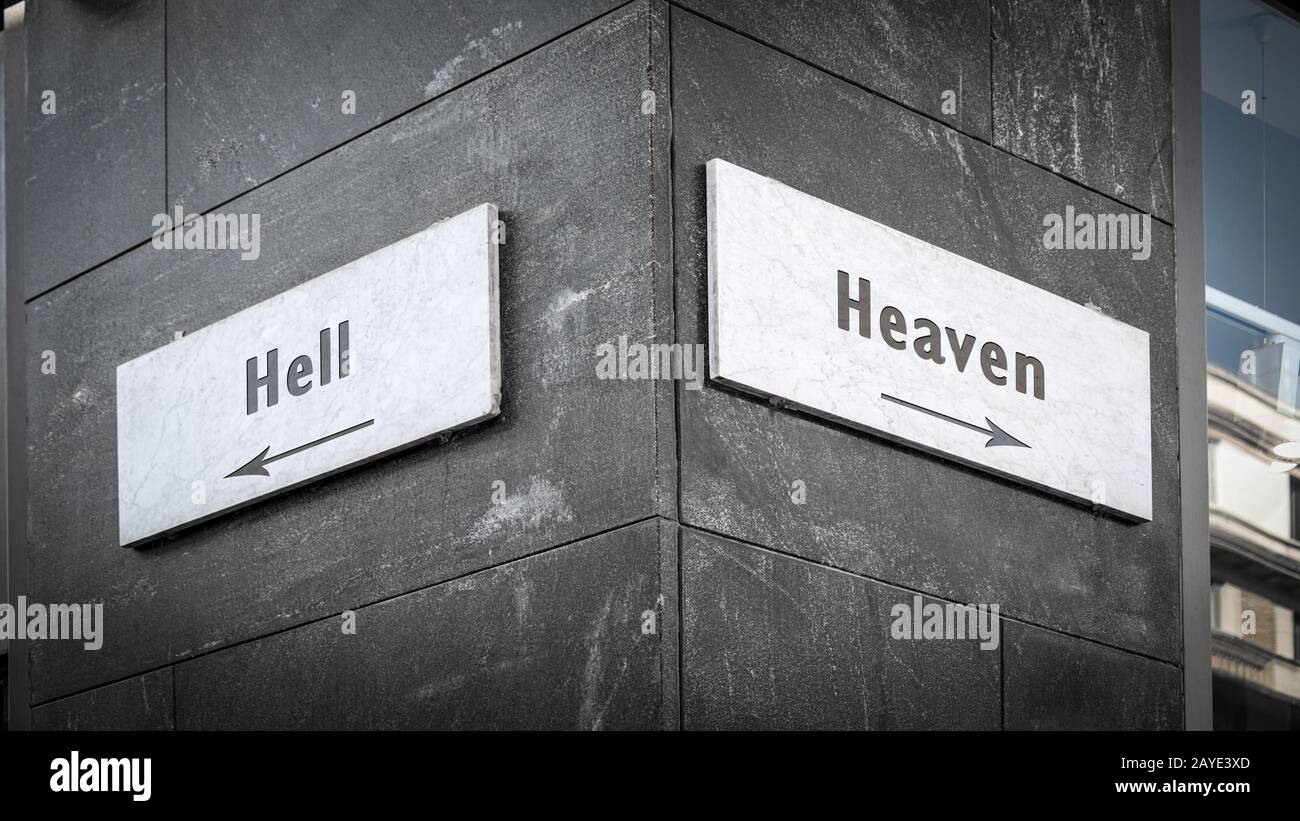 Street Sign Heaven versus Hell Stock Photo - Alamy