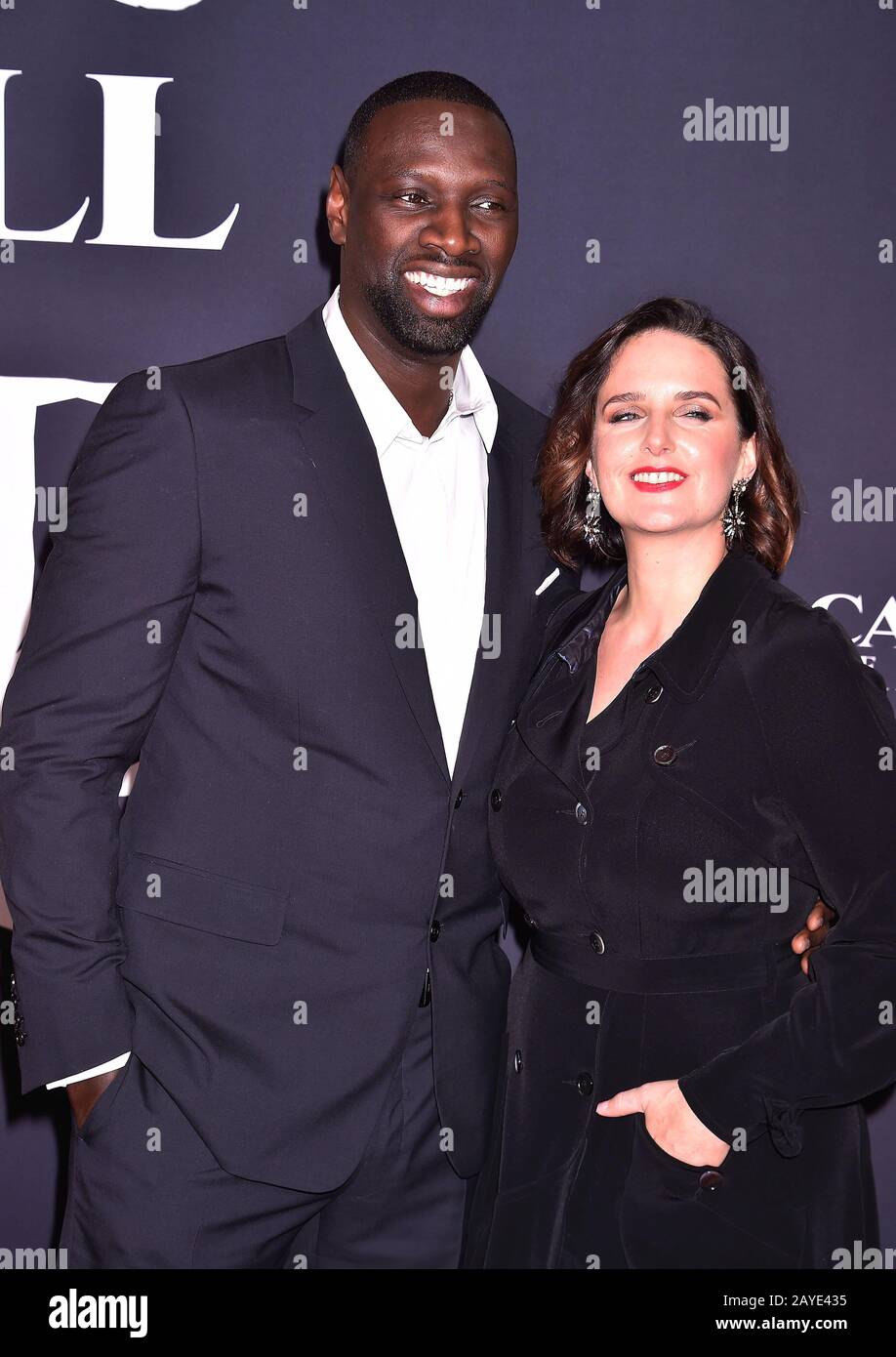 HOLLYWOOD, CA - FEBRUARY 13: Omar Sy and Hélène Sy attend the Premiere ...