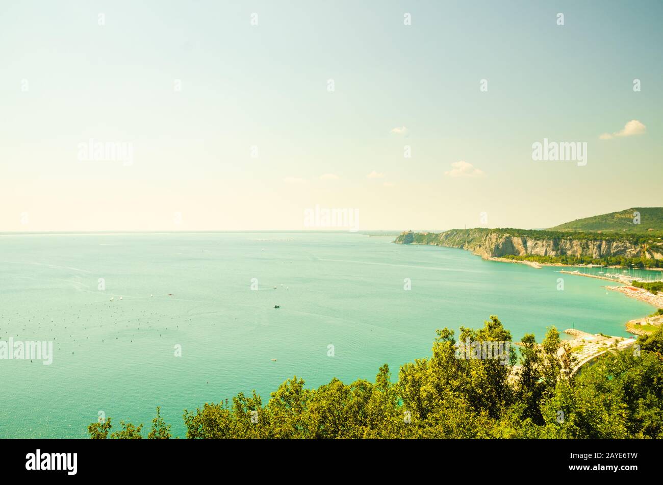 View at Bay with tourist resort in gulf of Trieste near town Sistiana ...