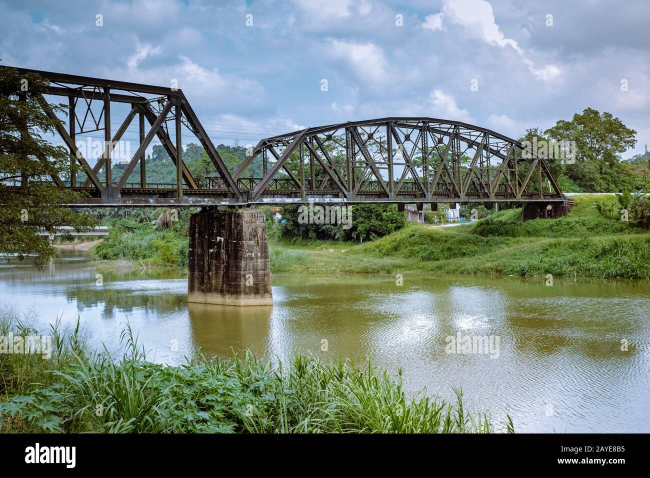 Lang Suan railroad over the river in Chumphon Thailand Stock Photo - Alamy