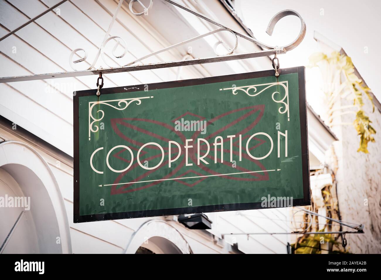 Street Sign to Cooperation Stock Photo - Alamy